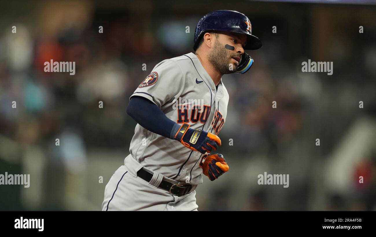 Houston Astros' Jose Altuve runs the bases after his solo home run ...