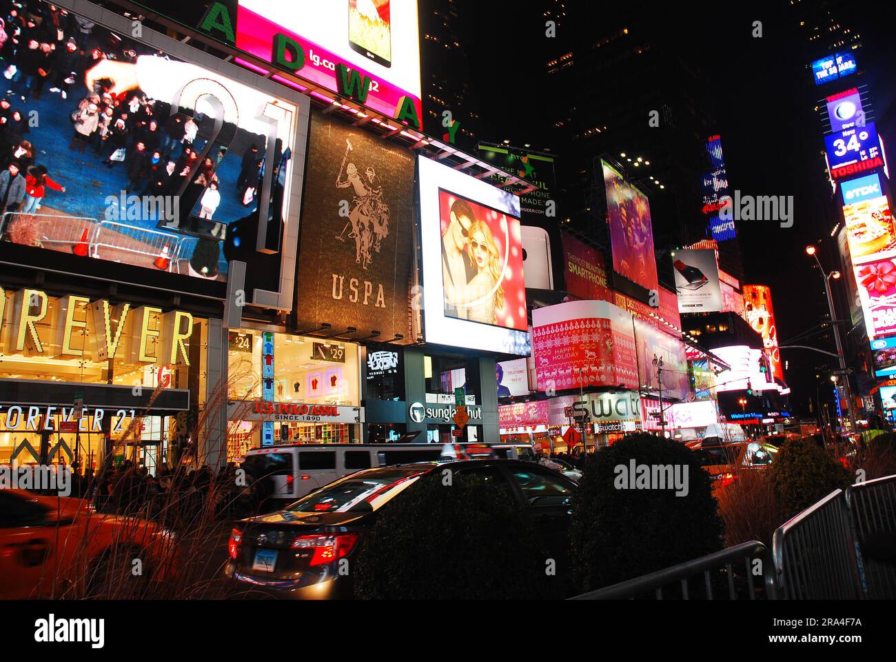Ads and video displays compete for attention in Times Square in ...