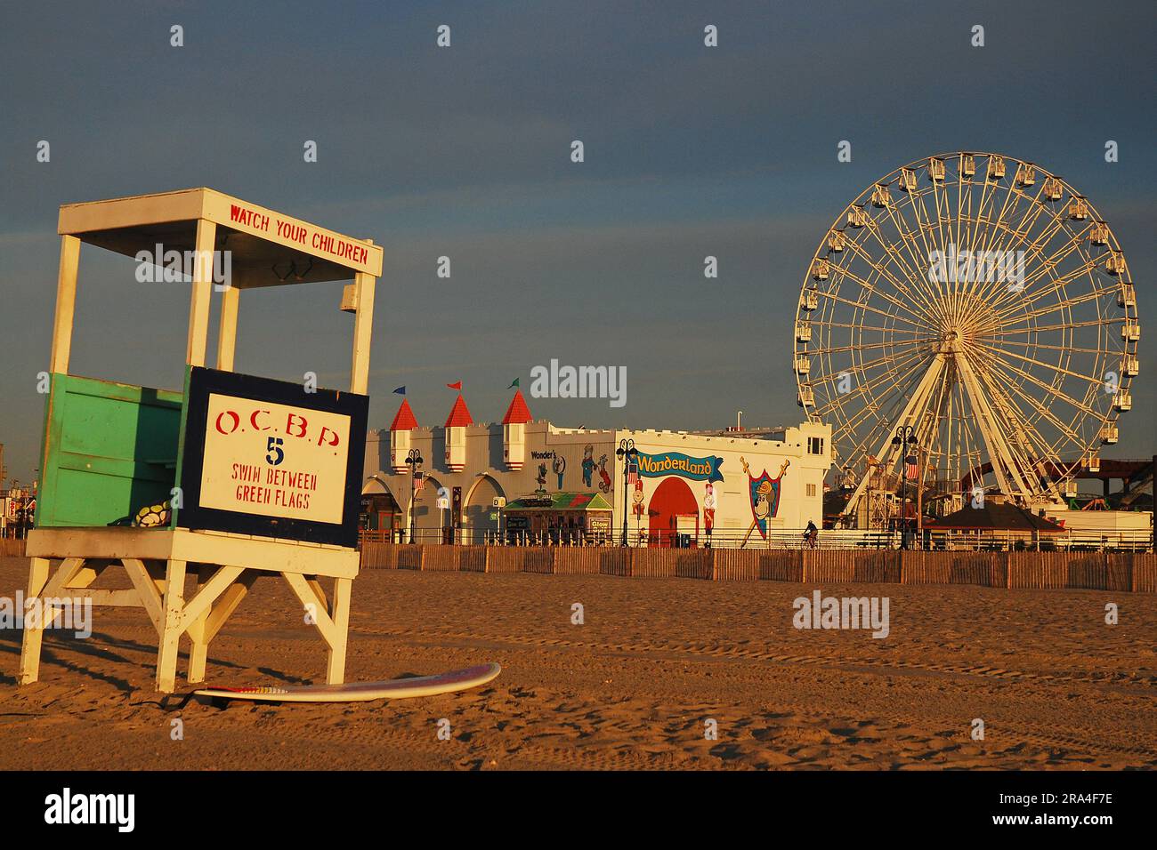 A Ferris wheel rises from the boardwalk in Ocean City New Jersey on a ...