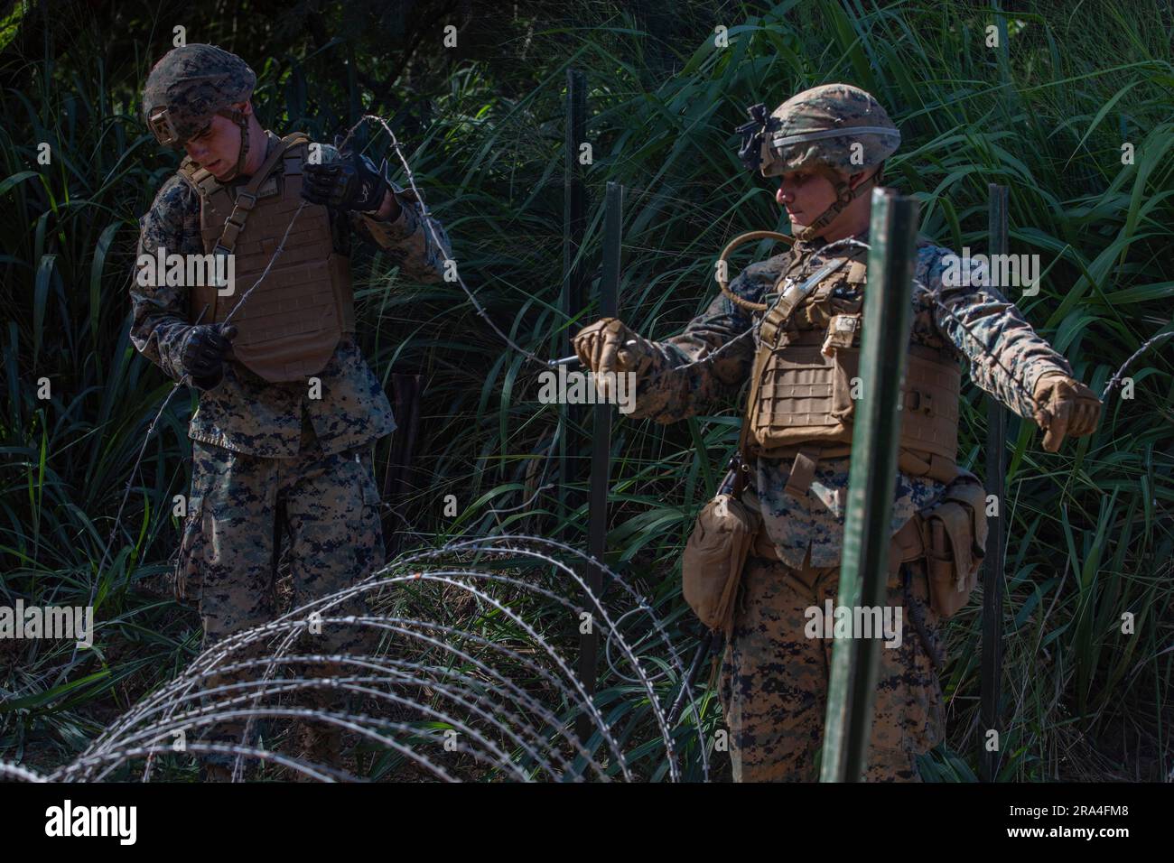 U.S. Marine Corps Sgt. Nicholas Mckinley (left) and Cpl. Davis Rojas ...