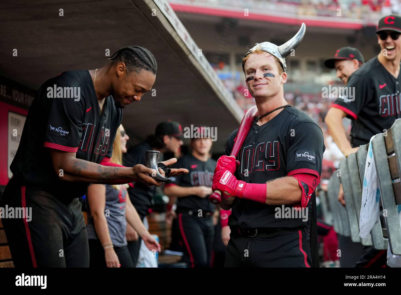 Cincinnati Reds' Matt McLain, right, poses for a photo with Will Benson ...