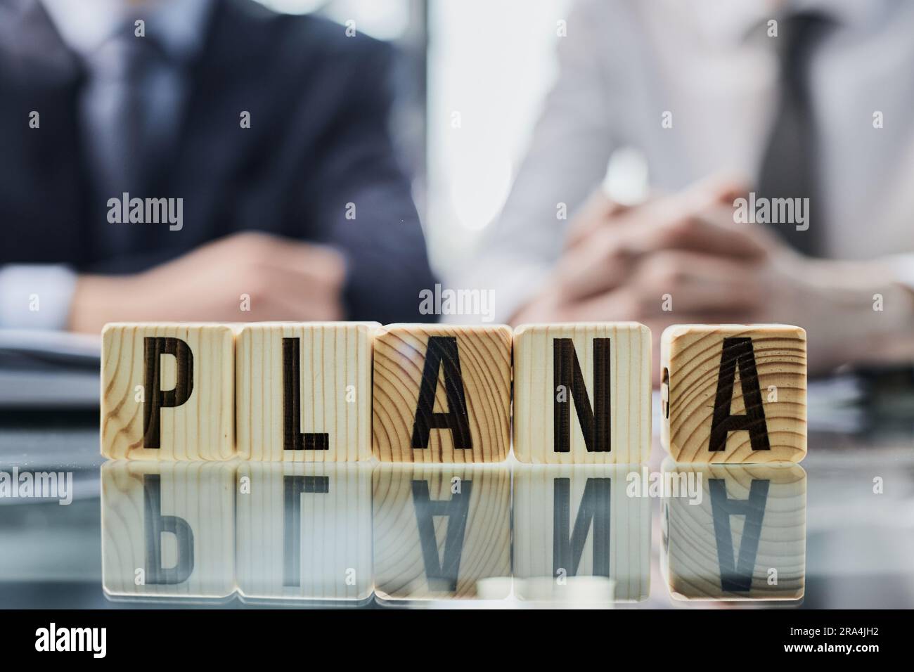 businessman folded the word Plan A from puzzles on the table. Success strategy and alternative ...