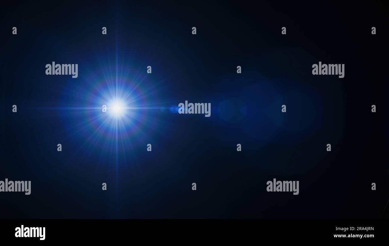 Bright star with four white and many blue beams. Chromatic aberration ...