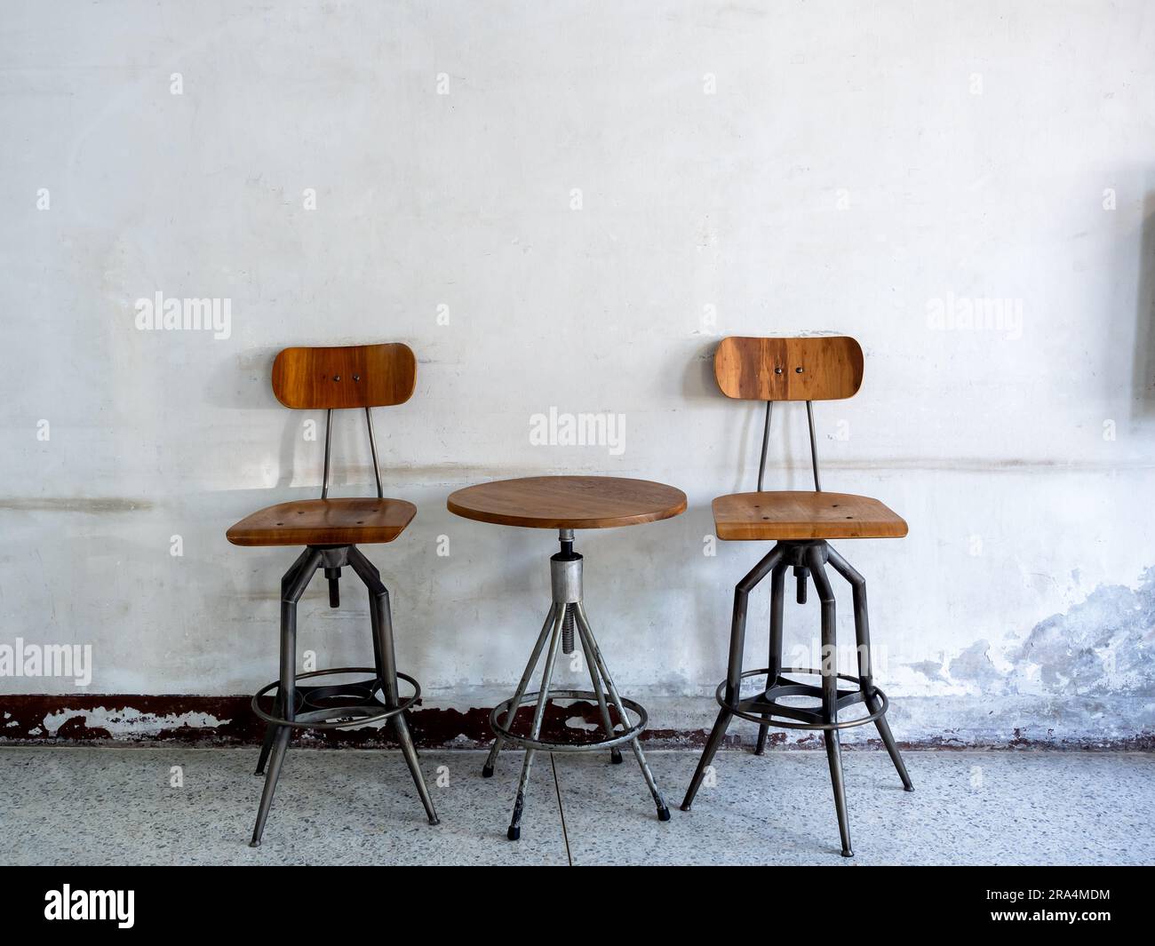 Empty vintage spinning chairs backrest, seat and round spinning side ...