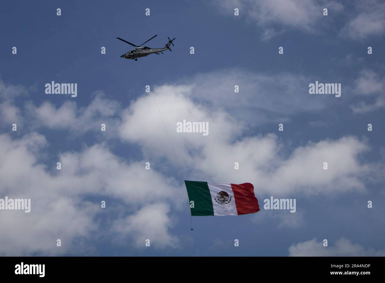 Mexican flag flying in the air (Photo by Luis Salgado/Pacific Press ...