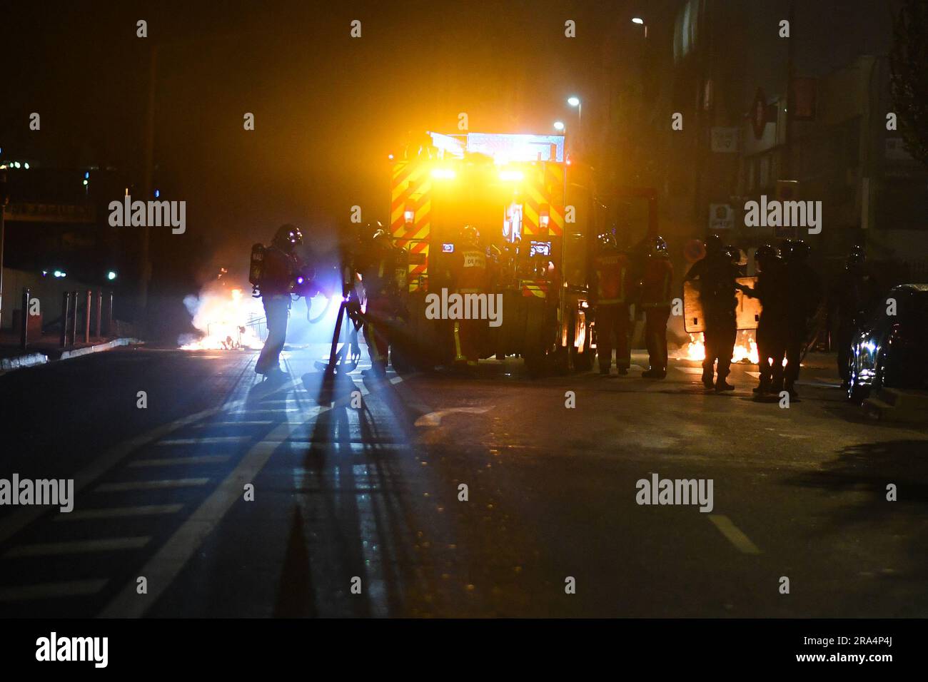 Charenton, France. 01st July, 2023. Firefighters extinguish fires set ...