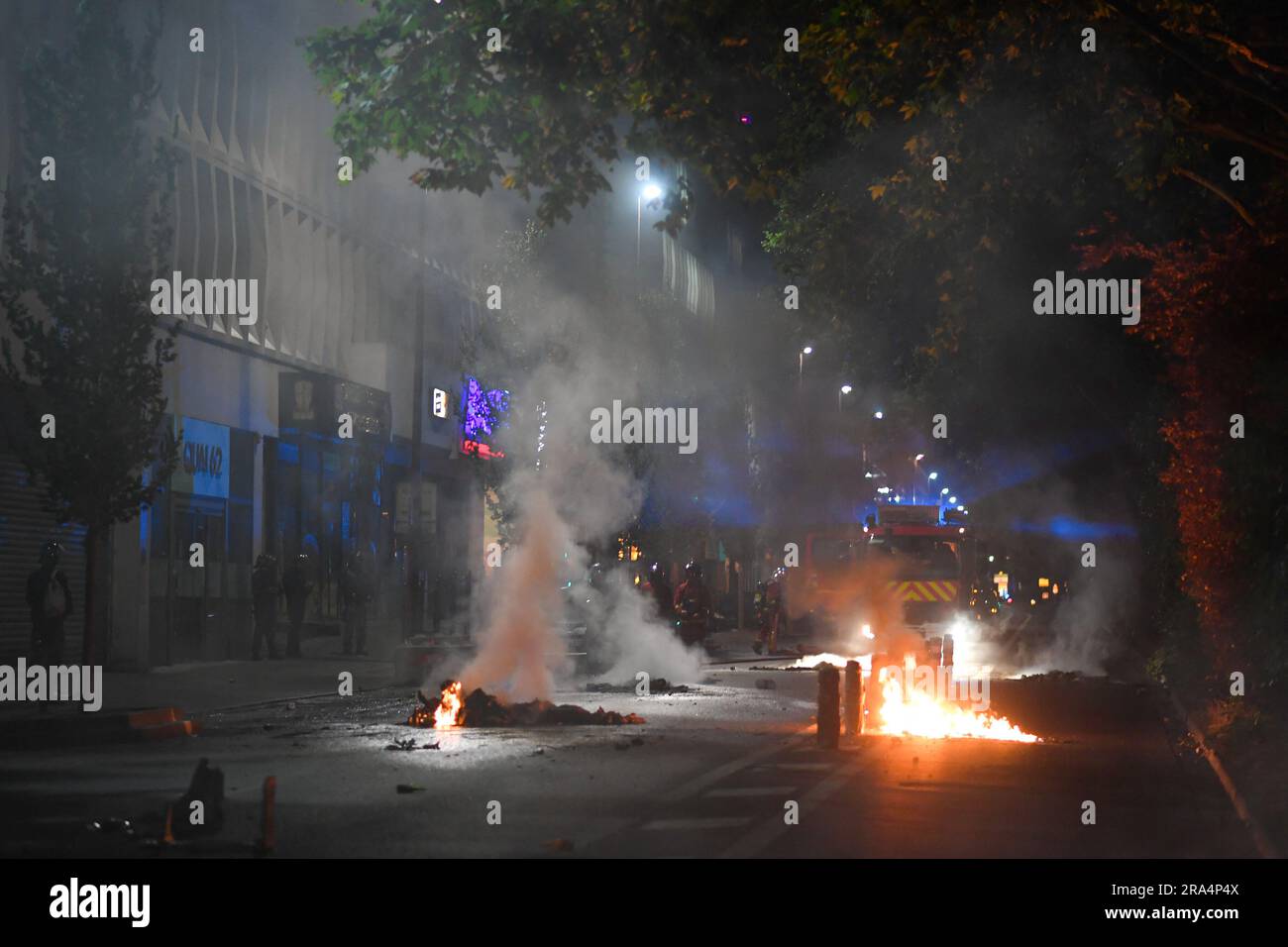 Charenton, France. 01st July, 2023. Firefighters extinguish fires set ...