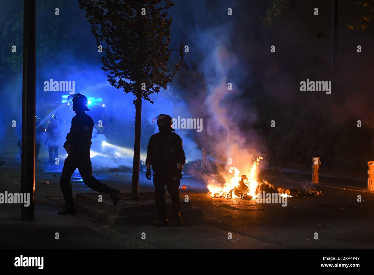 Charenton, France. 01st July, 2023. Firefighters extinguish fires set ...