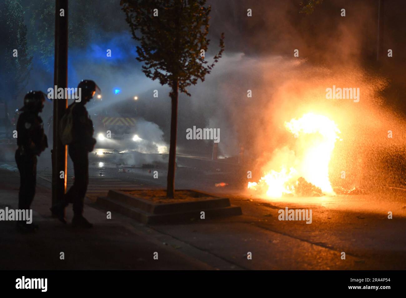 Charenton, France. 01st July, 2023. Firefighters extinguish fires set ...
