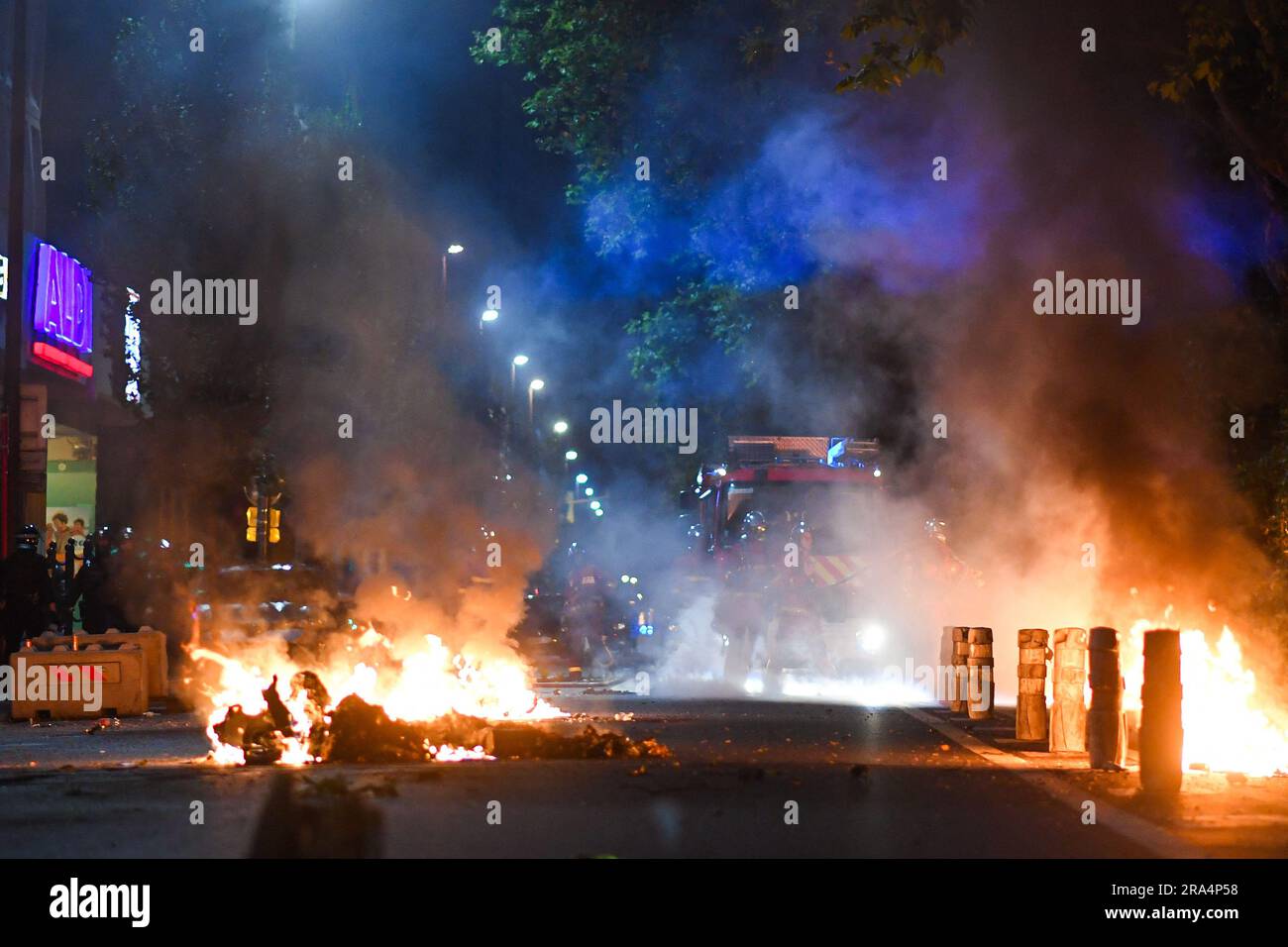 Charenton, France. 01st July, 2023. Firefighters extinguish fires set ...
