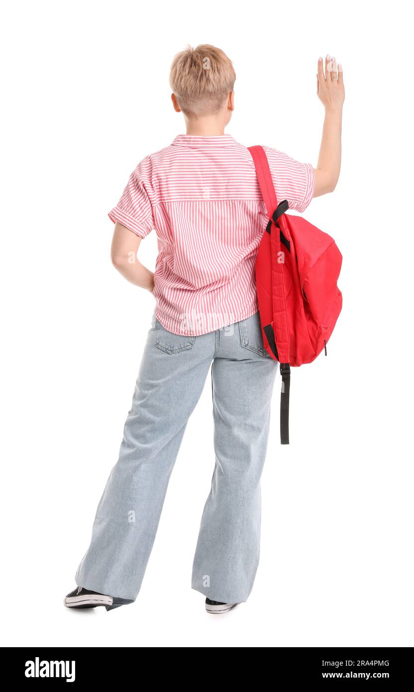 Female student with backpack waving hand on white background, back view ...