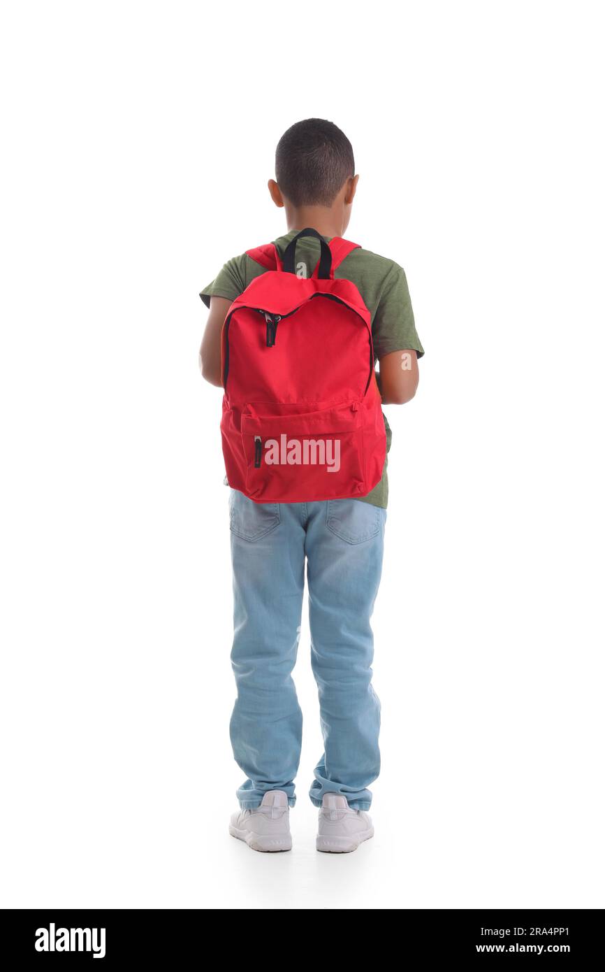 Little African-American schoolboy with backpack on white background ...
