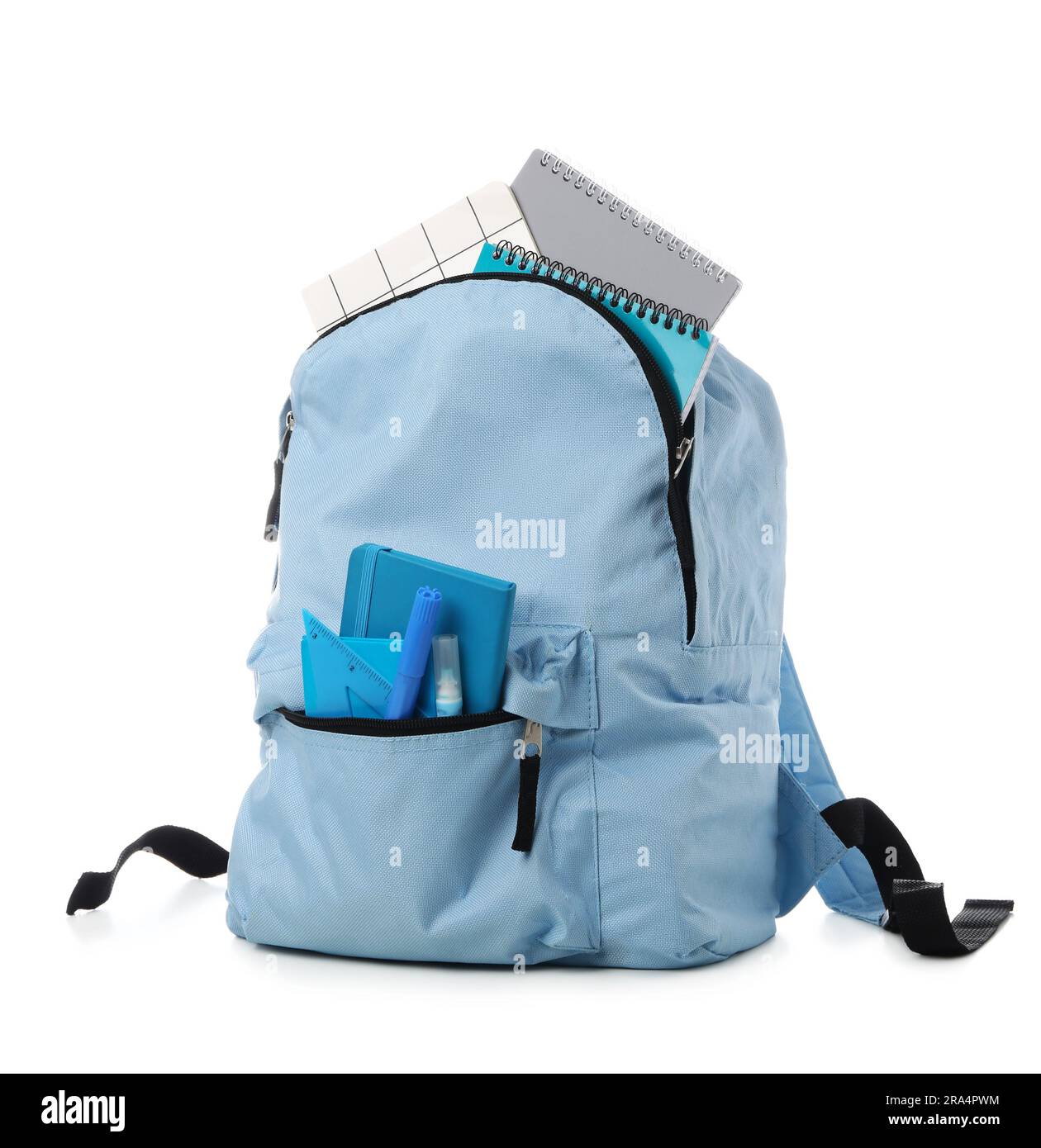 Blue school backpack with notebooks, markers and set square on white ...