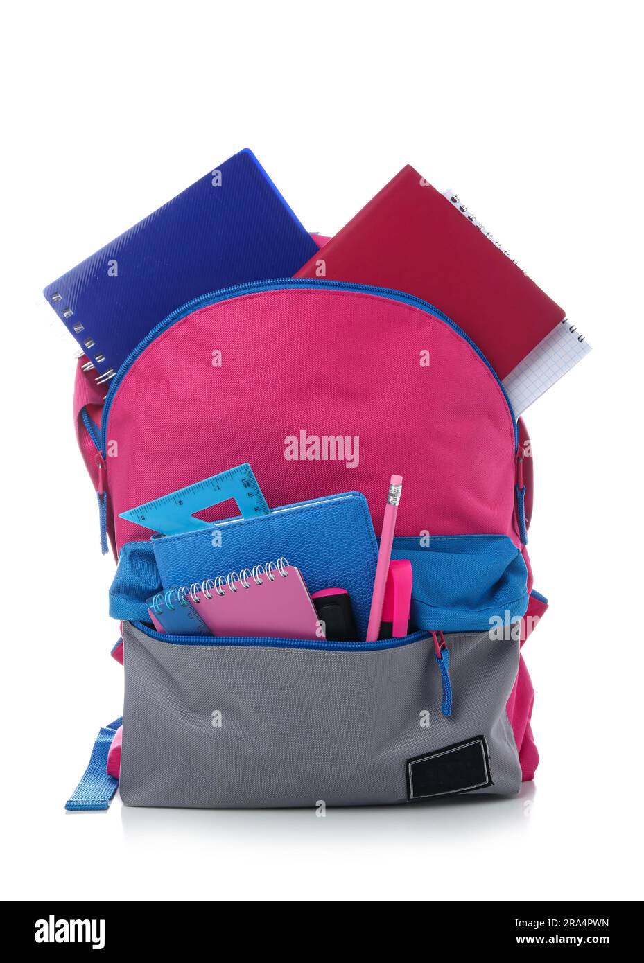 Color school backpack with notebooks, markers and rulers on white ...