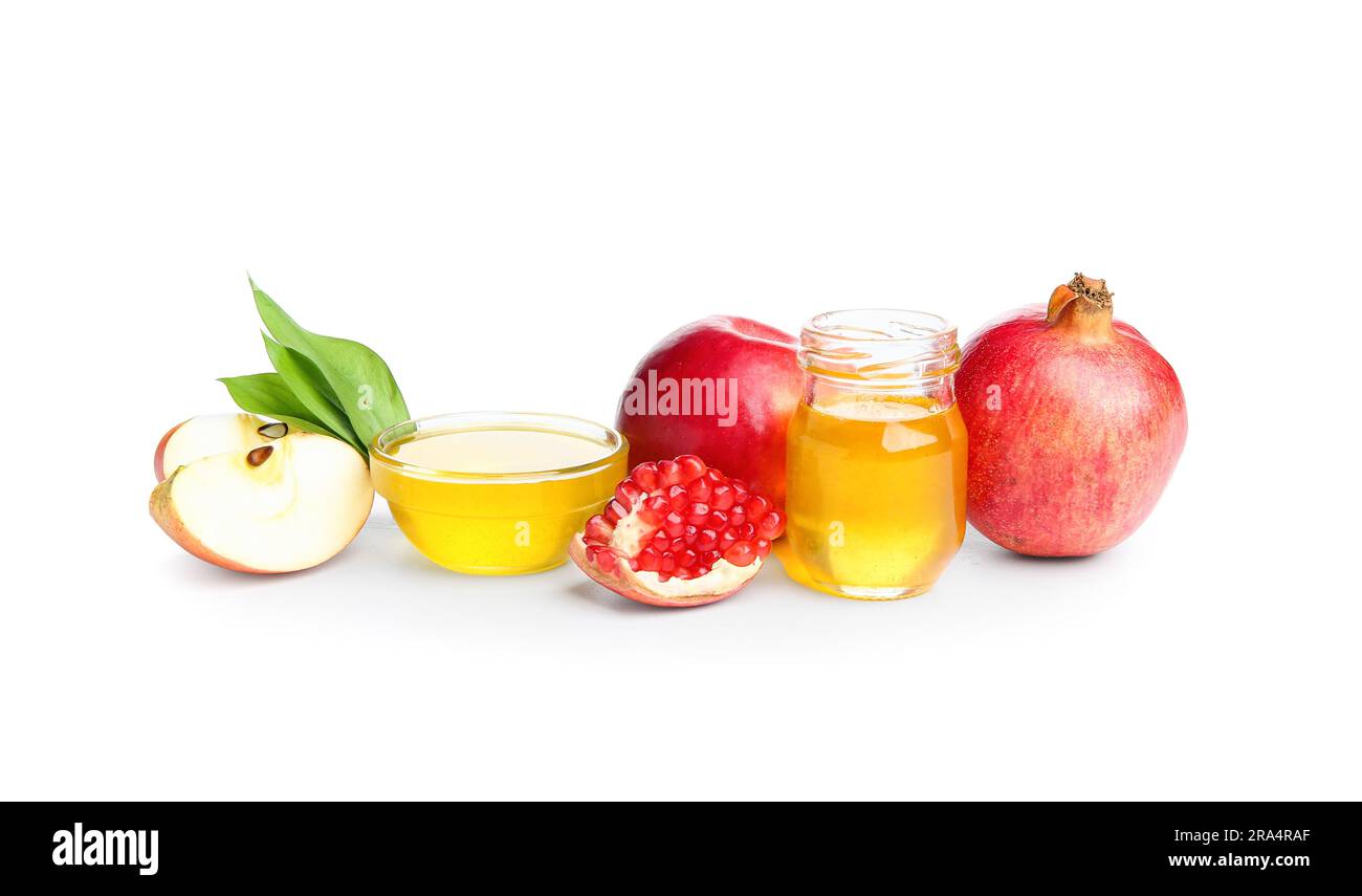 Composition with fresh fruits and honey on white background. Rosh ...