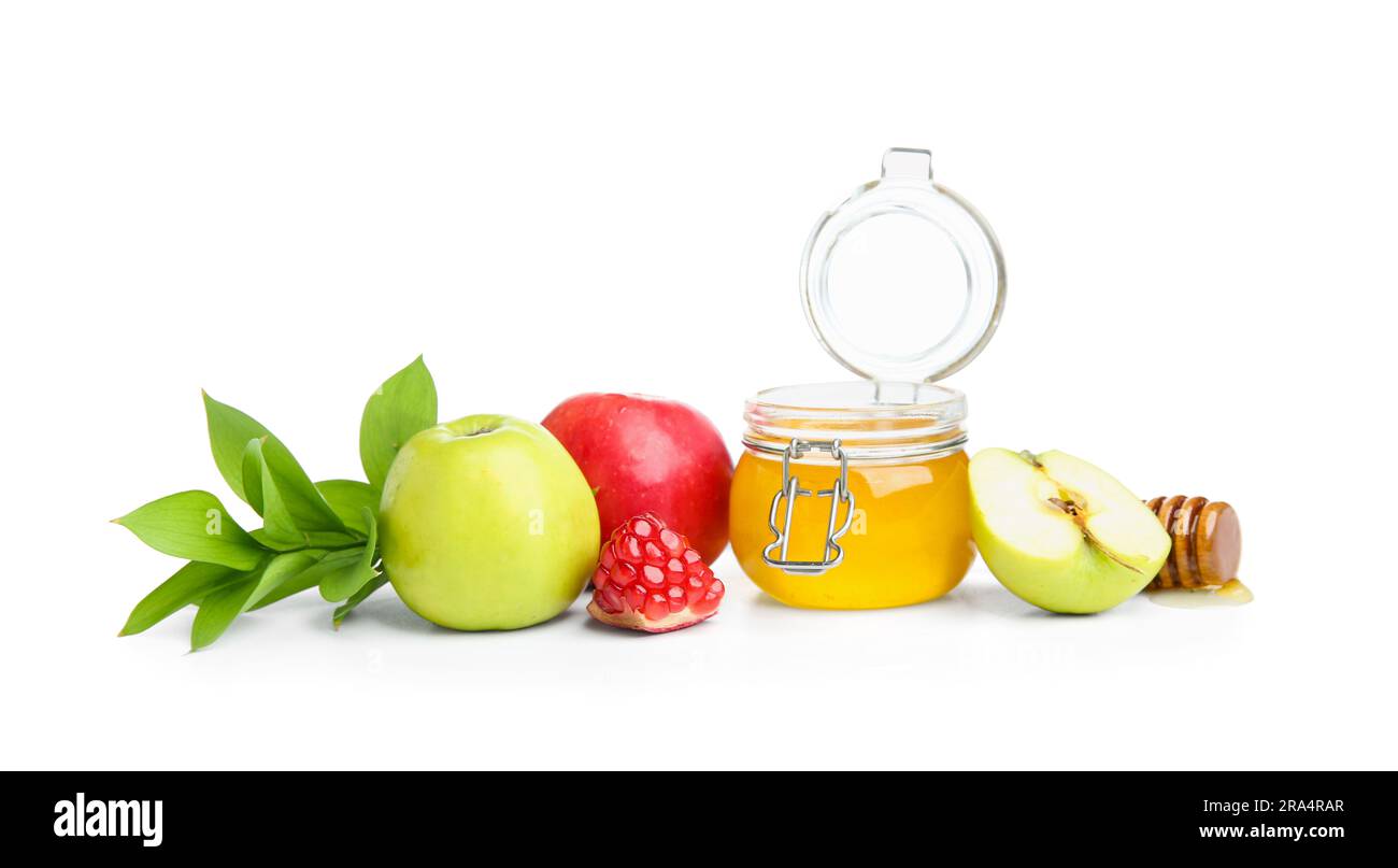 Composition with jar of honey, fresh fruits and plant branch on white ...