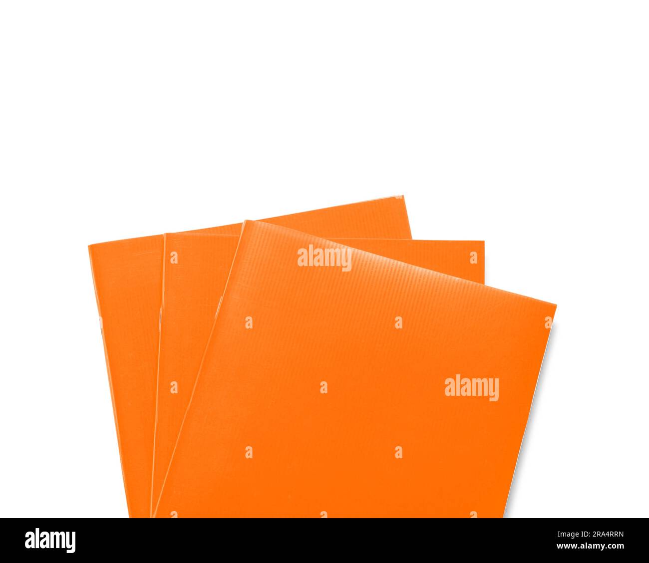 Orange notebooks isolated on white background Stock Photo - Alamy