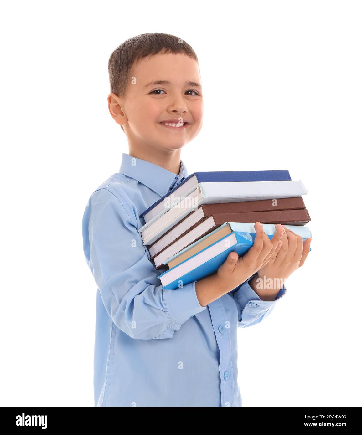 Little schoolboy with books on white background Stock Photo - Alamy