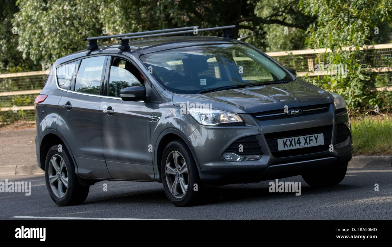 Milton Keynes,UK - June 24th 2023. 2014 grey diesel engine FORD KUGA ...