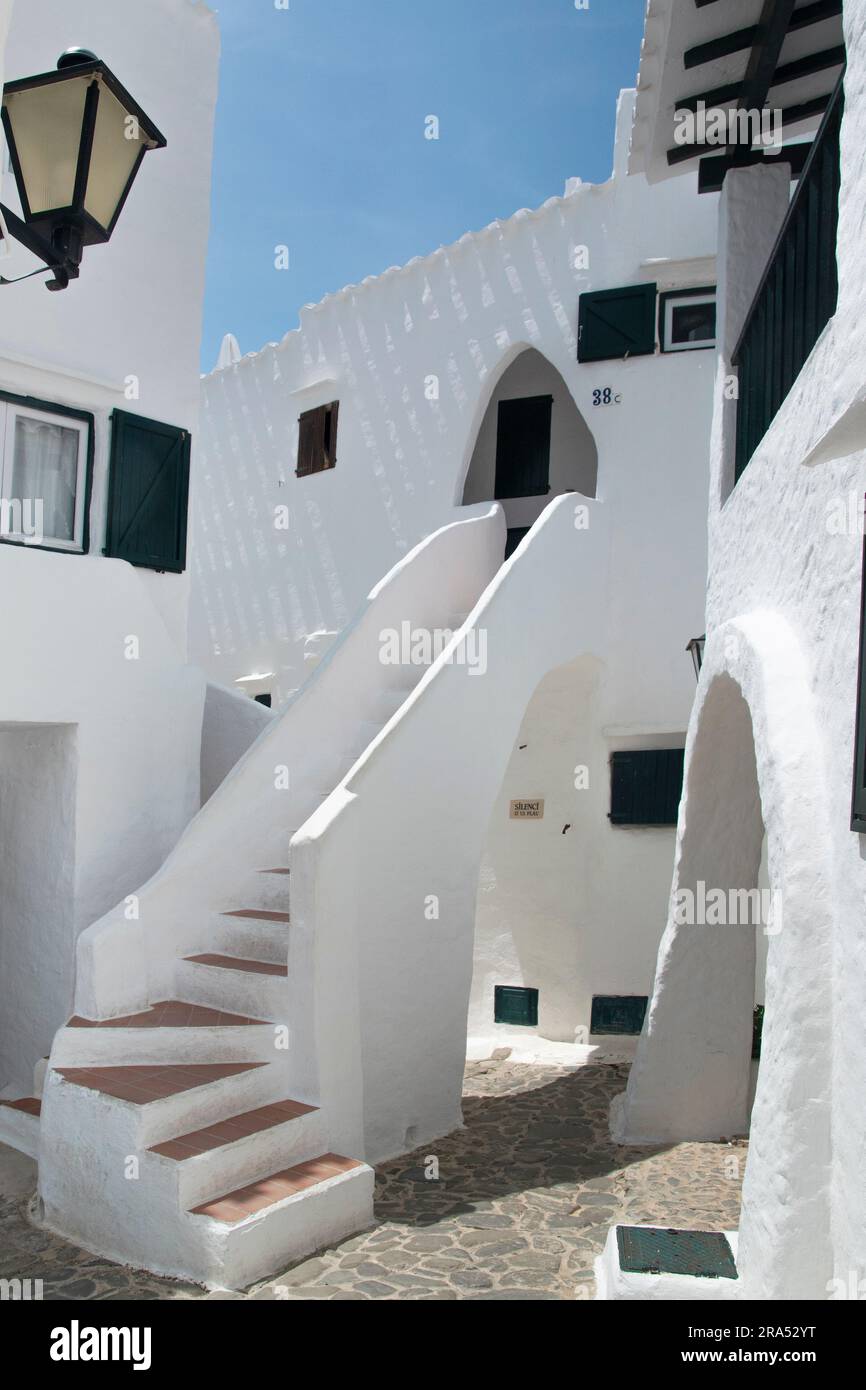 Streets and white walls of touristic fishing village of Binibeca Vell ...