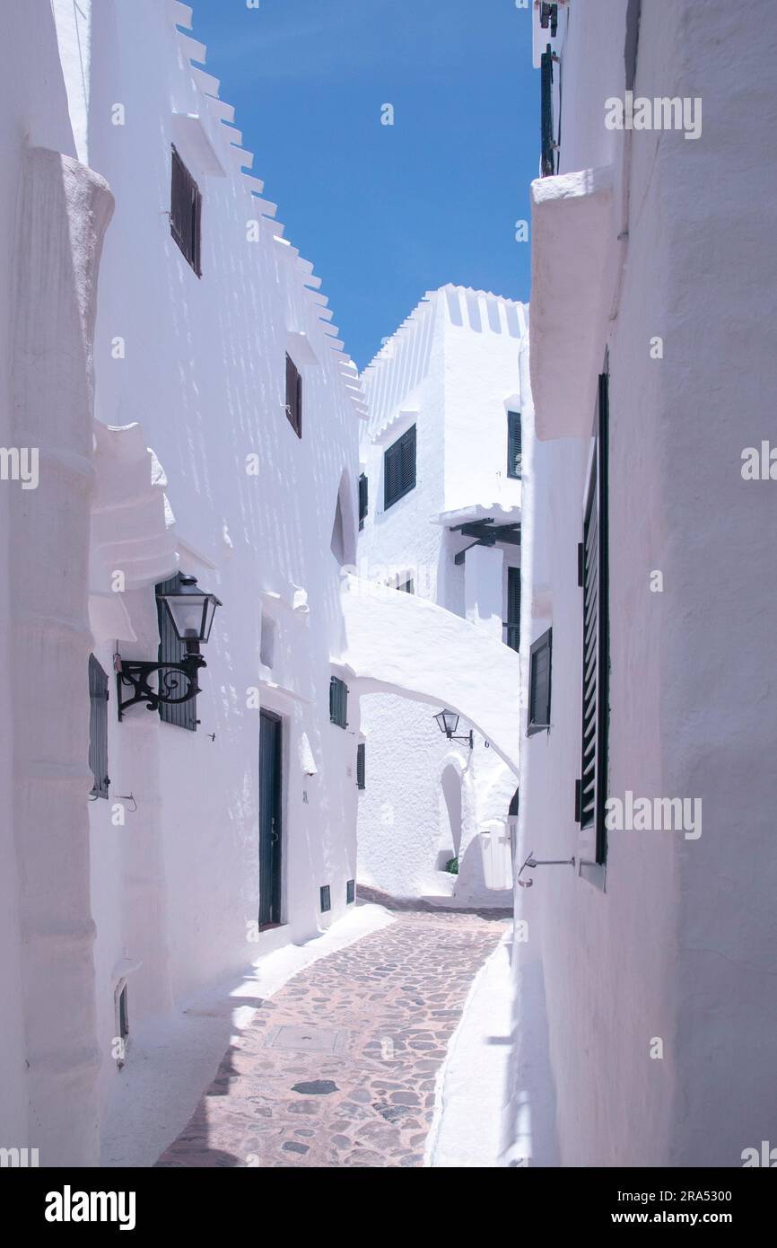 Streets and white walls of touristic fishing village of Binibeca Vell ...