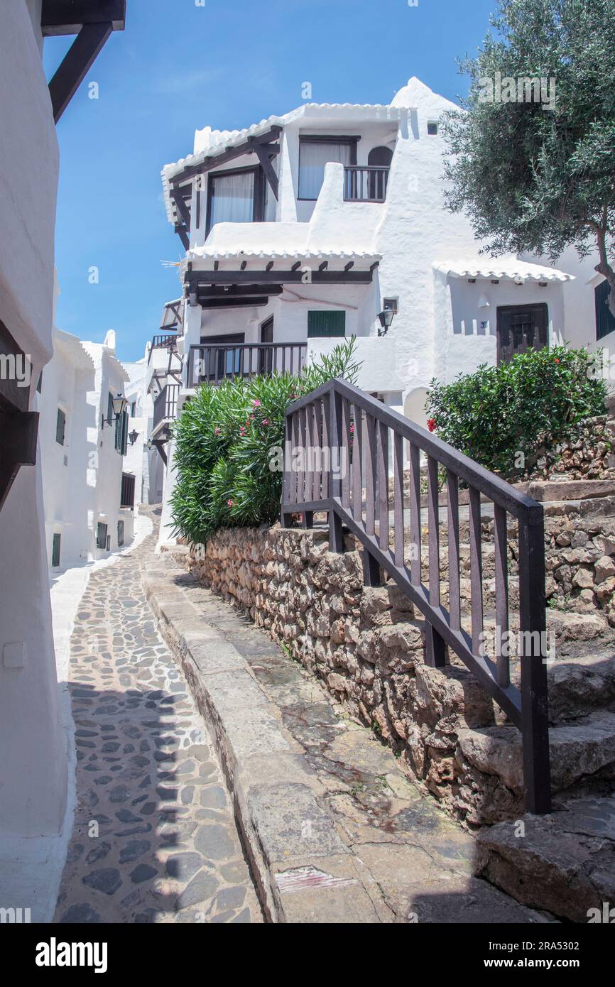 Streets and white walls of touristic fishing village of Binibeca Vell ...
