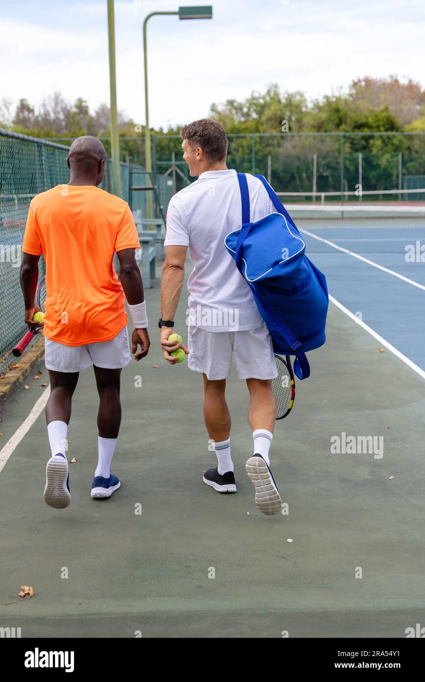 Happy diverse male tennis players hi-res stock photography and images ...