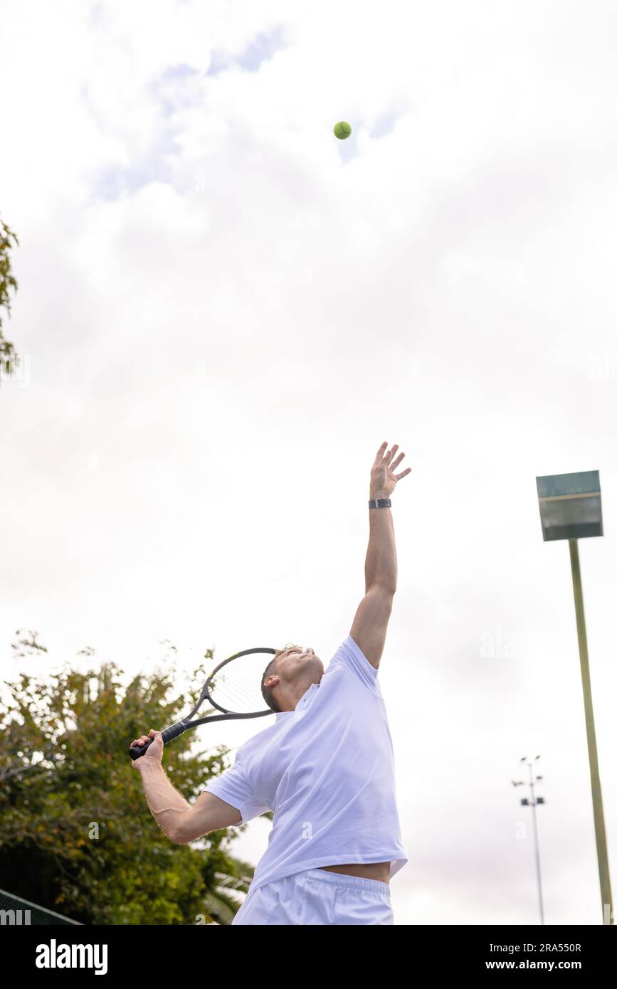 Male player serving ball hi-res stock photography and images - Alamy