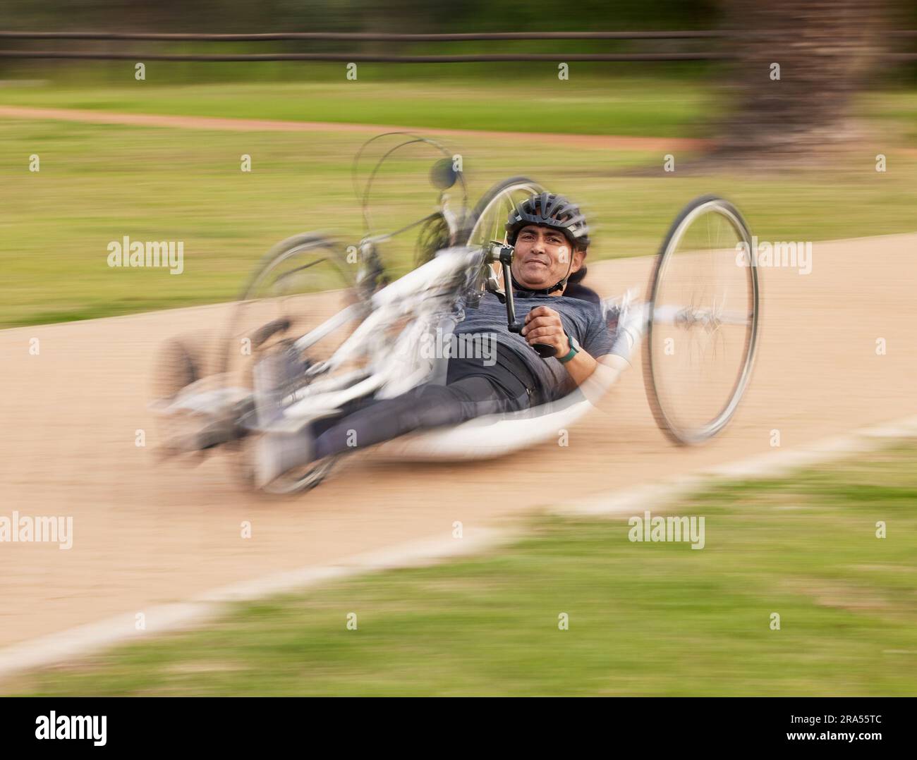 Fast, disability and fitness with man and bike with handicap for ...