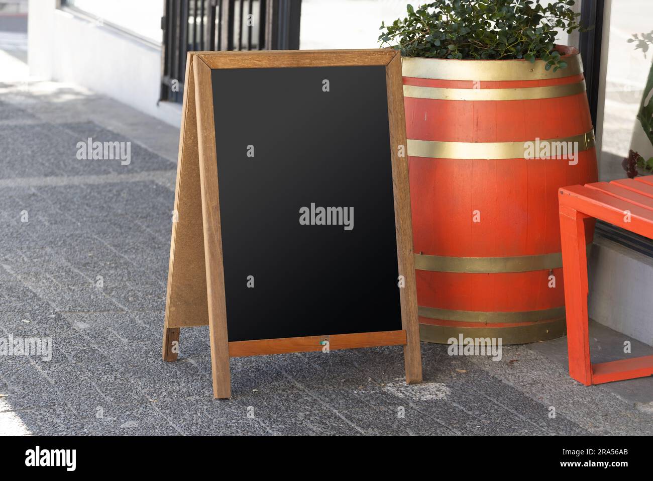 Blank sign standing on pavement with copy space Stock Photo - Alamy