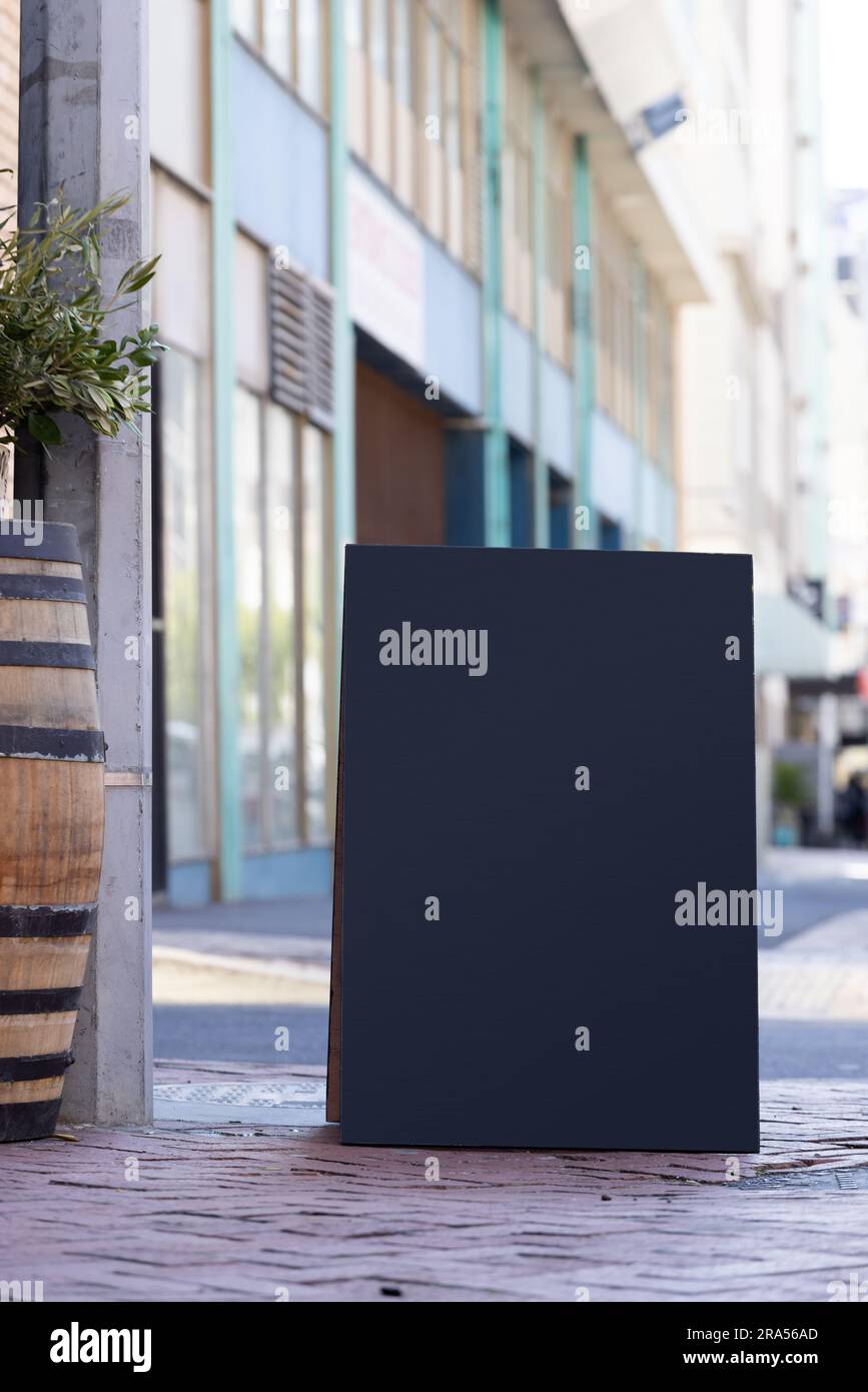 Blank sign standing on pavement with copy space Stock Photo - Alamy