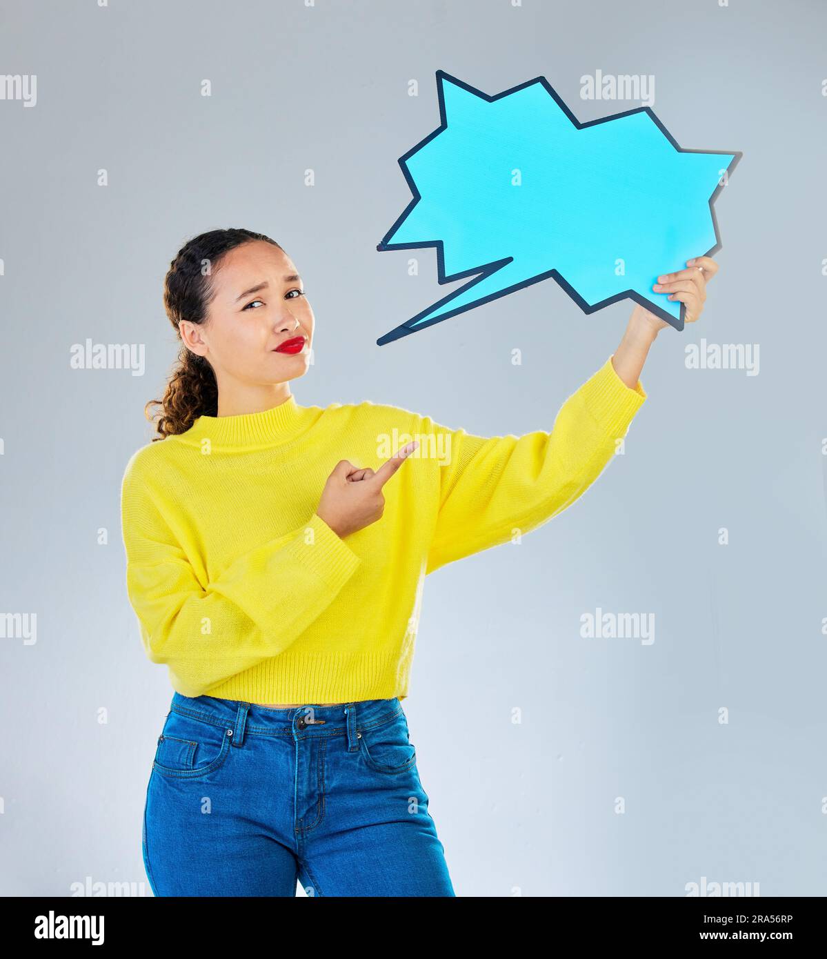 Speech bubble, confused and woman pointing to chat, social media ...