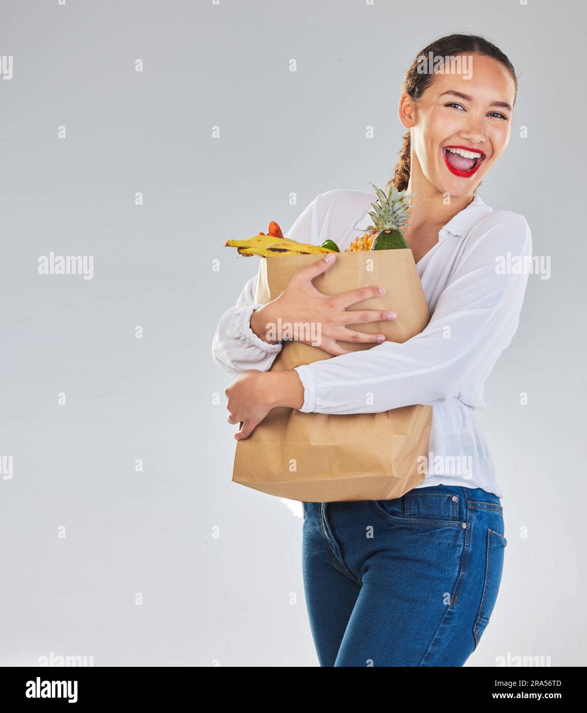 Excited, portrait and woman grocery shopping for fruits on mockup space ...