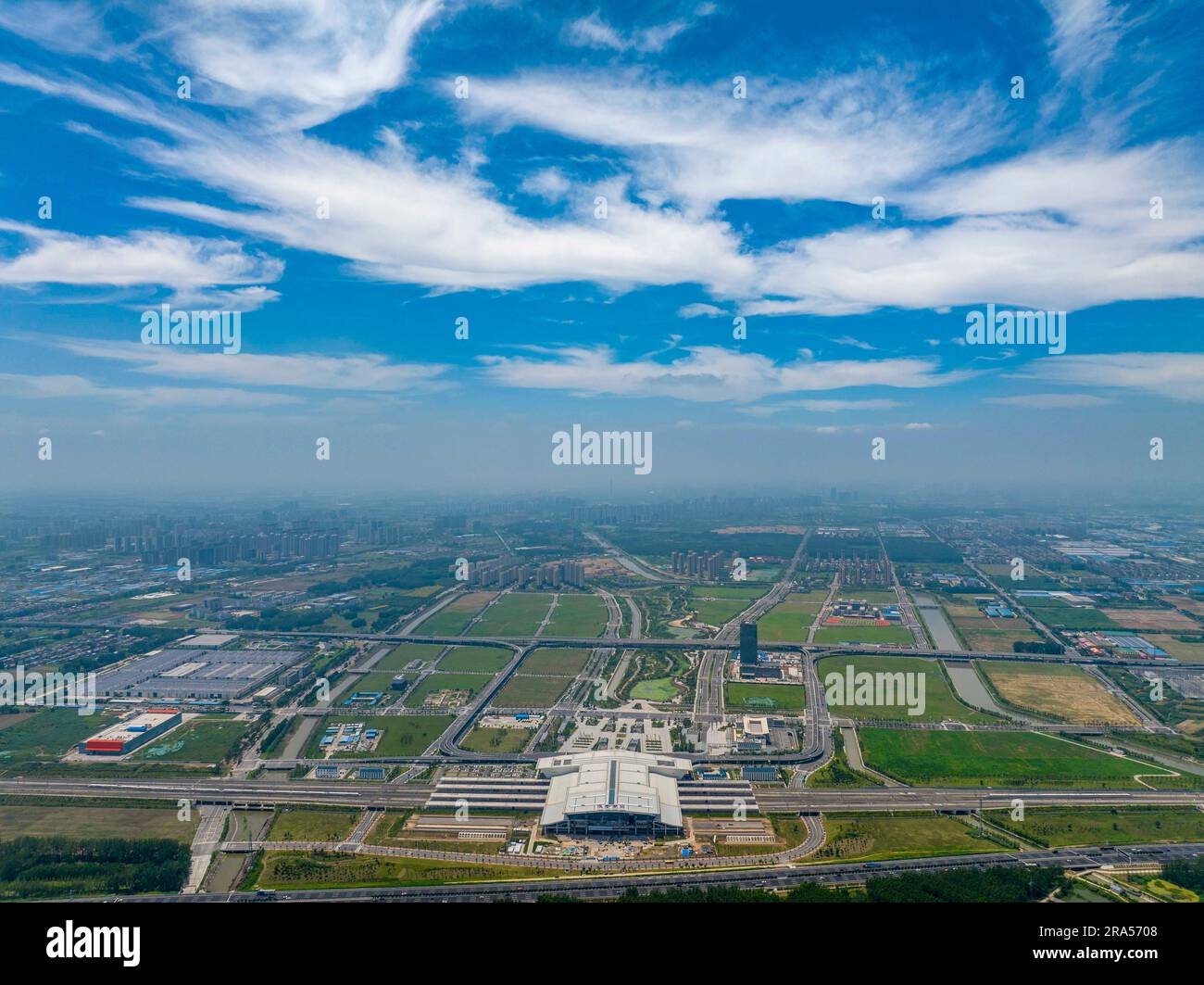 HUAI'AN, CHINA - JULY 1, 2023 - A EMU train enters and exits the East ...