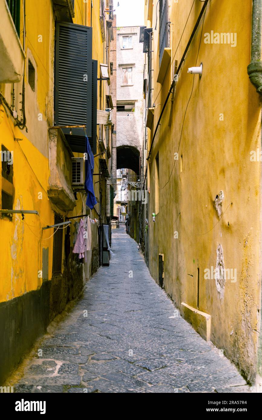 Narrow city street in the historical center of Naples Stock Photo - Alamy