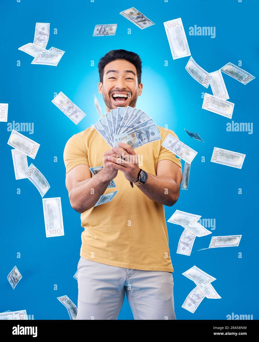 Happy, portrait of a man with money fan and in a blue background for ...