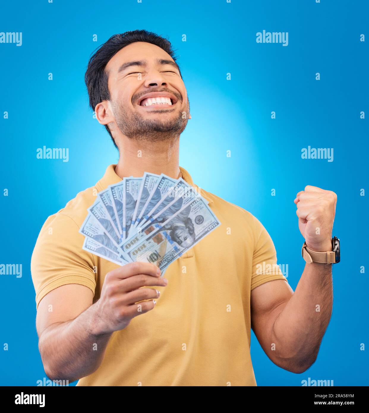 Money, studio and man excited, cheers and smile for dollar bills ...