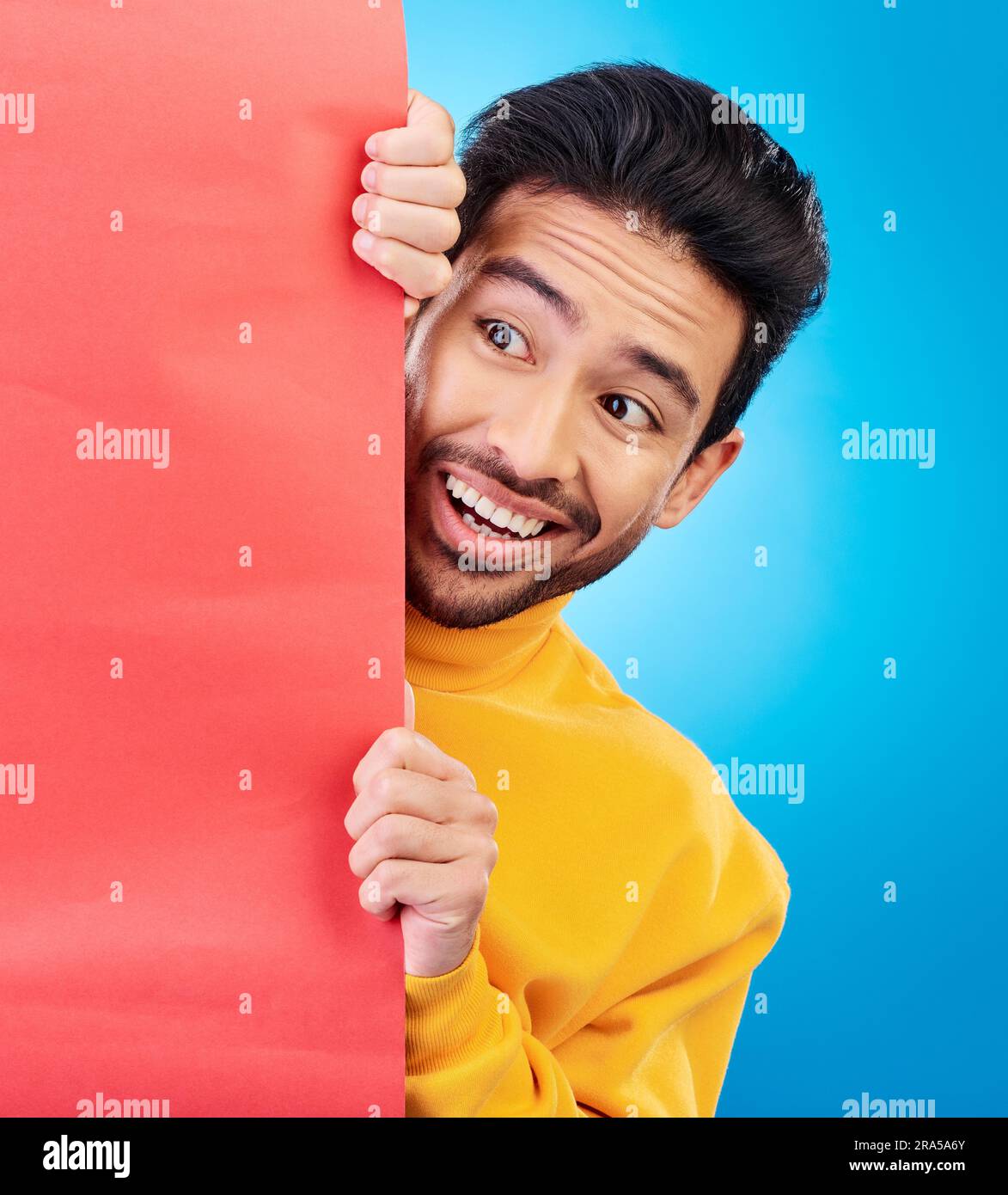 Shock, hide and young man with billboard with wow, omg or wtf facial ...