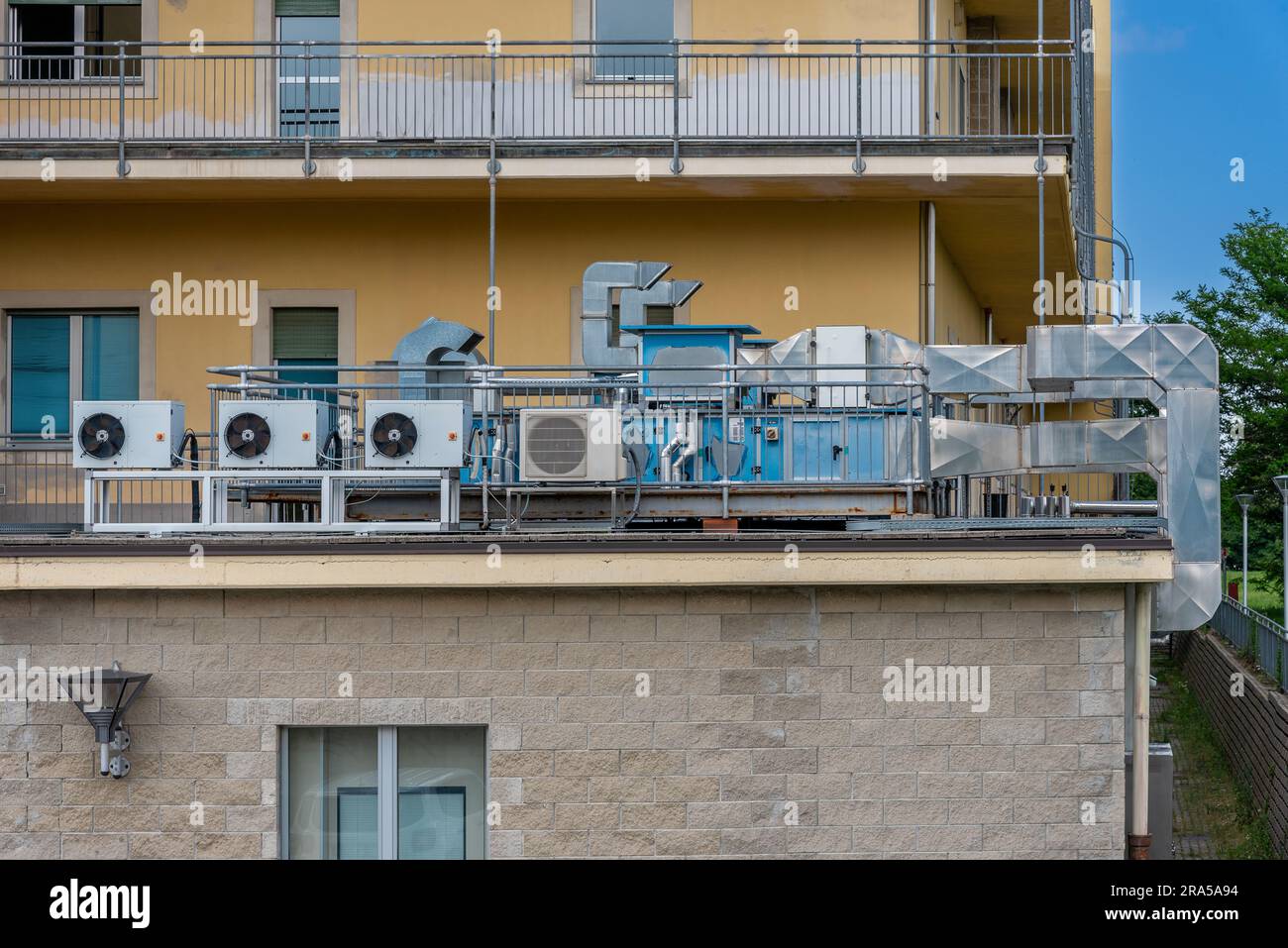 Air conditioning units (HVAC) with compressors installed outside the ...
