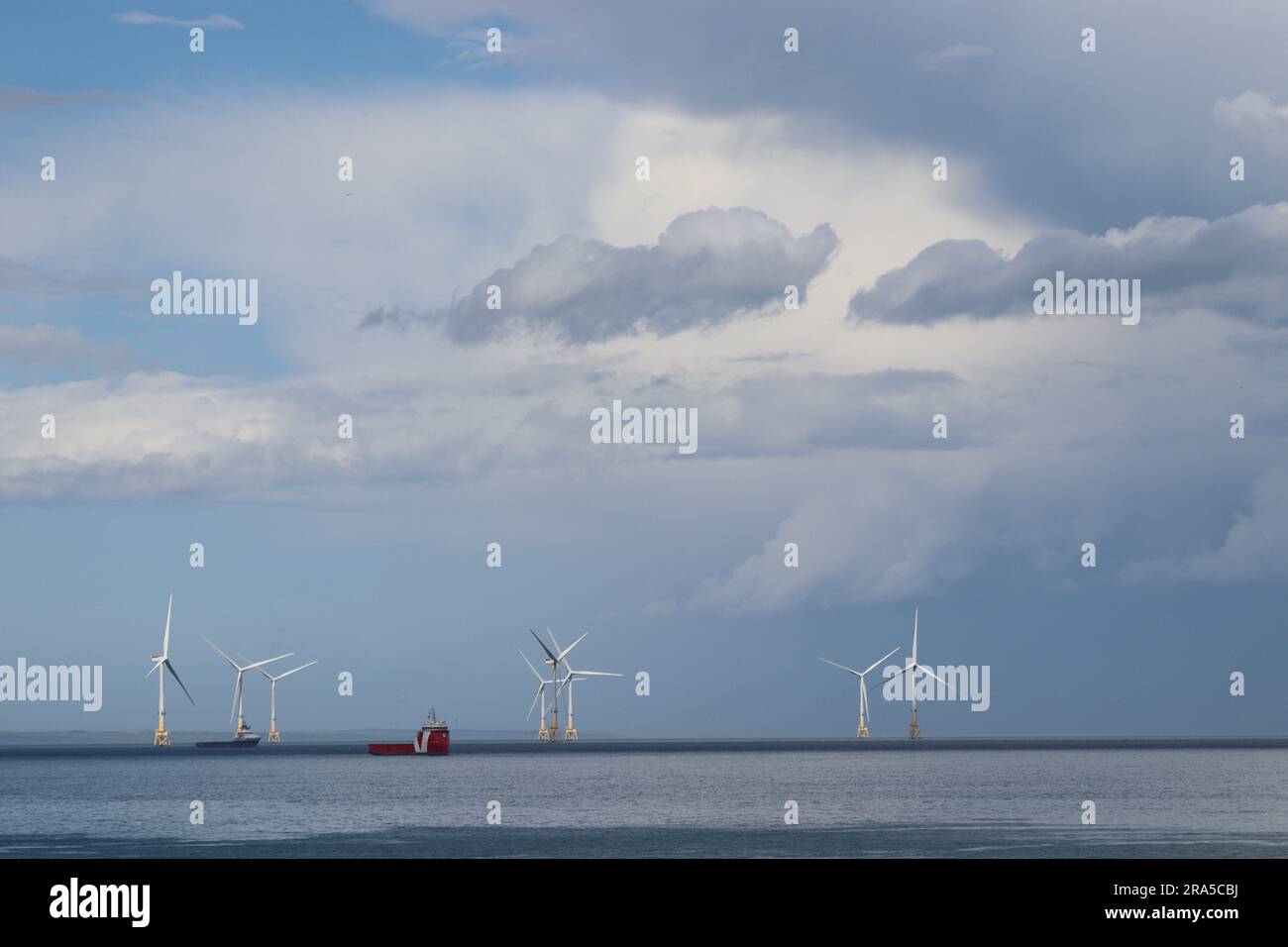Boats and wind turbines Stock Photo - Alamy