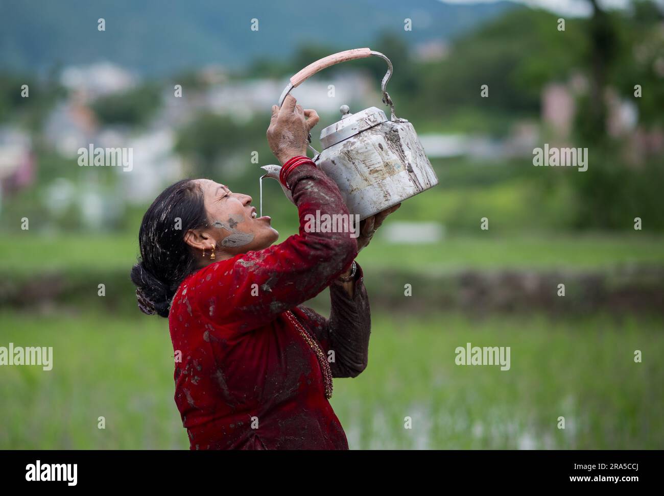 Kathmandu, Nepal. 30th June, 2023. A woman drinks a traditional ...