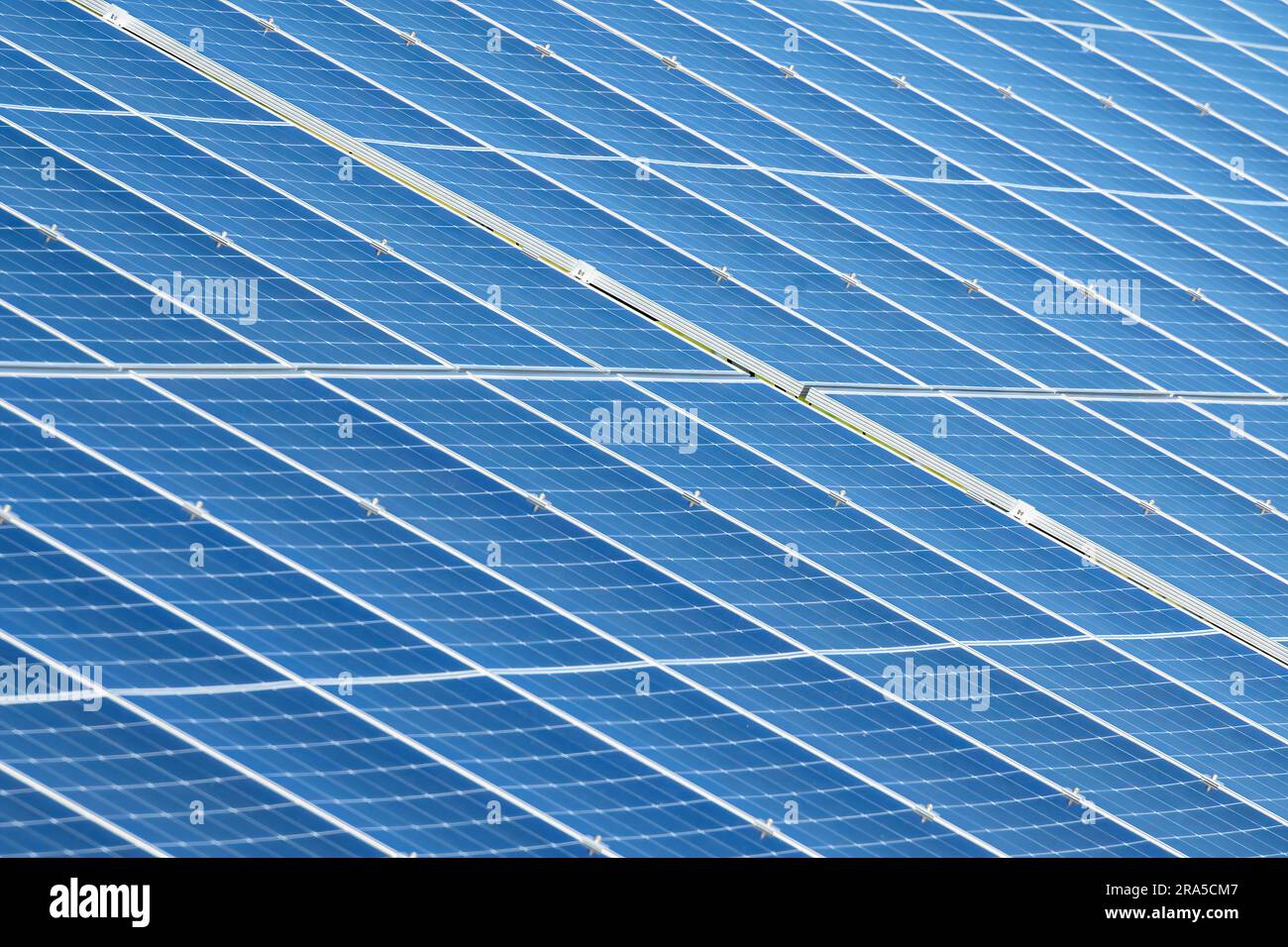 Close-up of the surface of solar cells. Landscape of solar panels at a ...