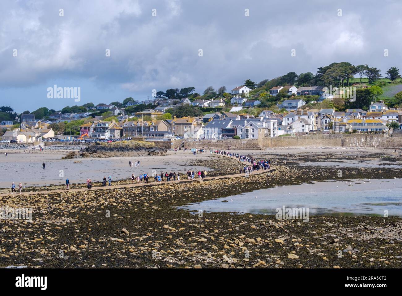 People crossing the ancient causeway to St Michael’s Mount during low ...