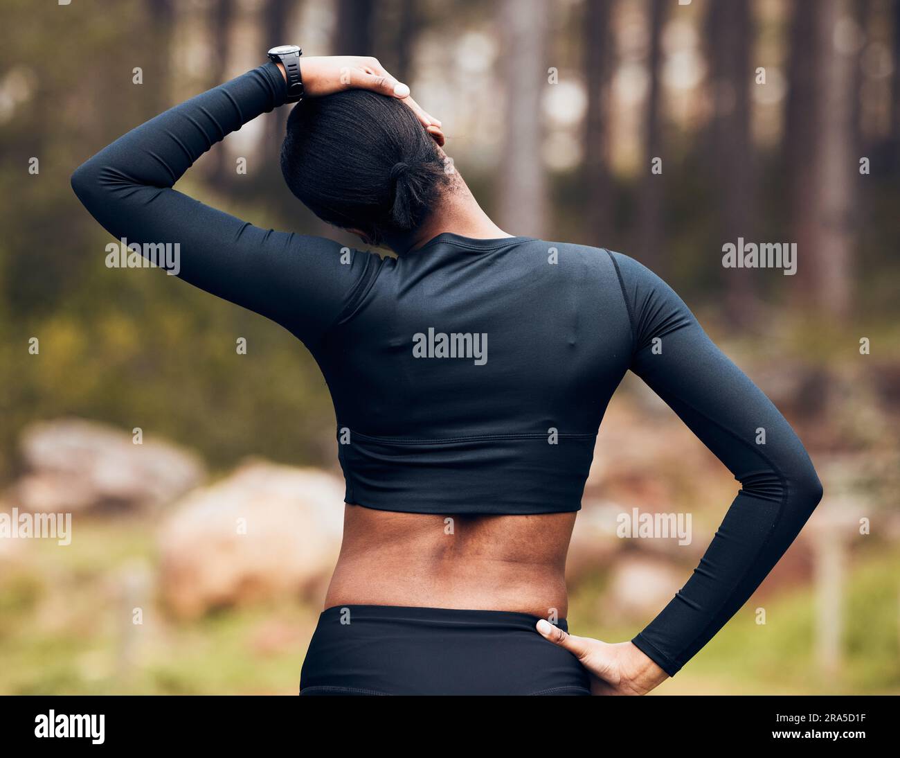 Exercise, stretching neck and back of woman in nature for fitness ...