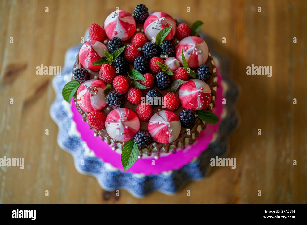 Home made cake with forest fruitschocolate and meringues Stock Photo ...