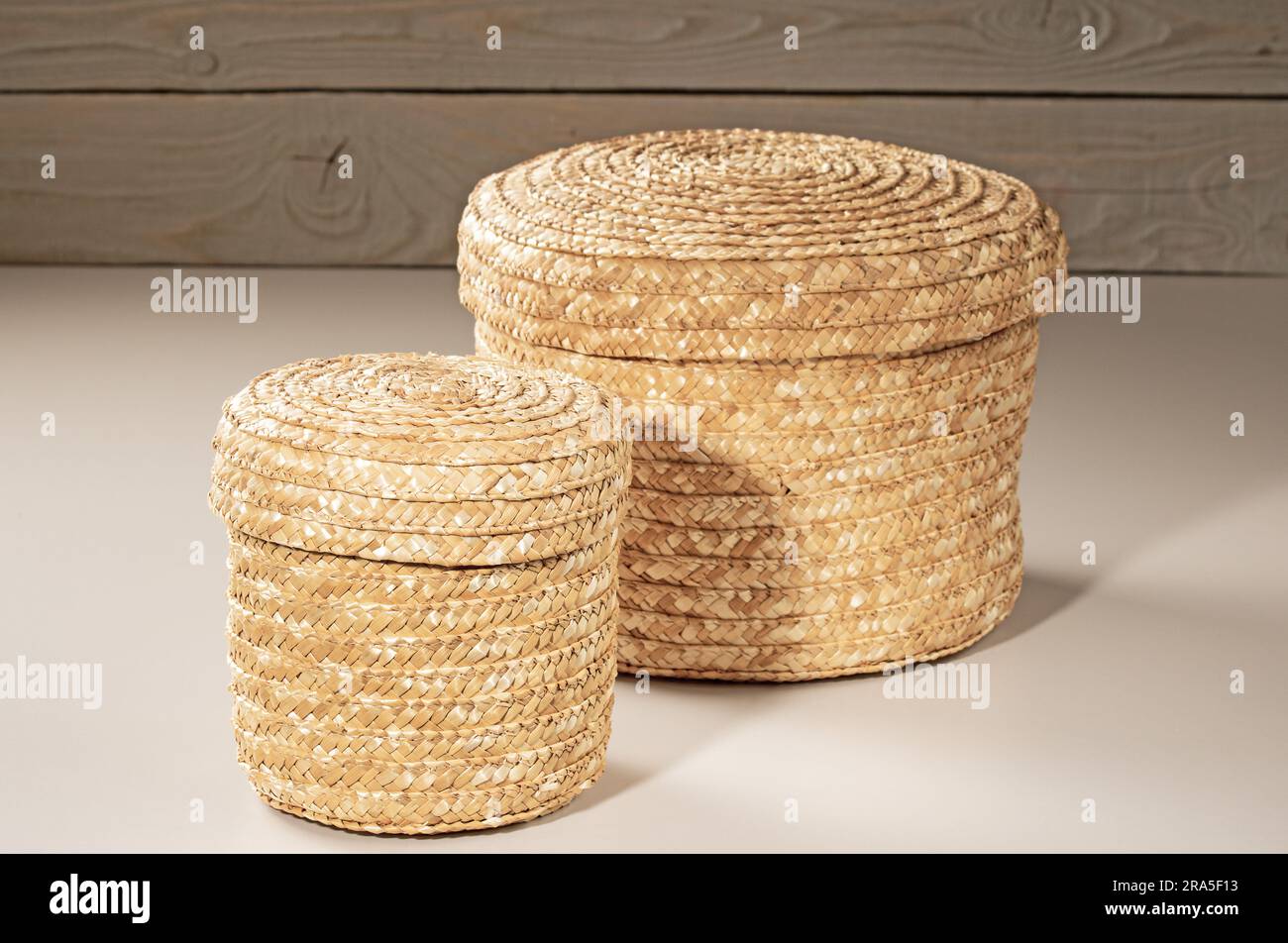 Two baskets - large and small, woven from rattan, for storing household ...