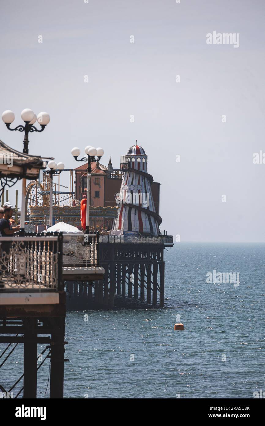 Fairground rides at the end of Brighton Palace Pier in June 2023, UK ...