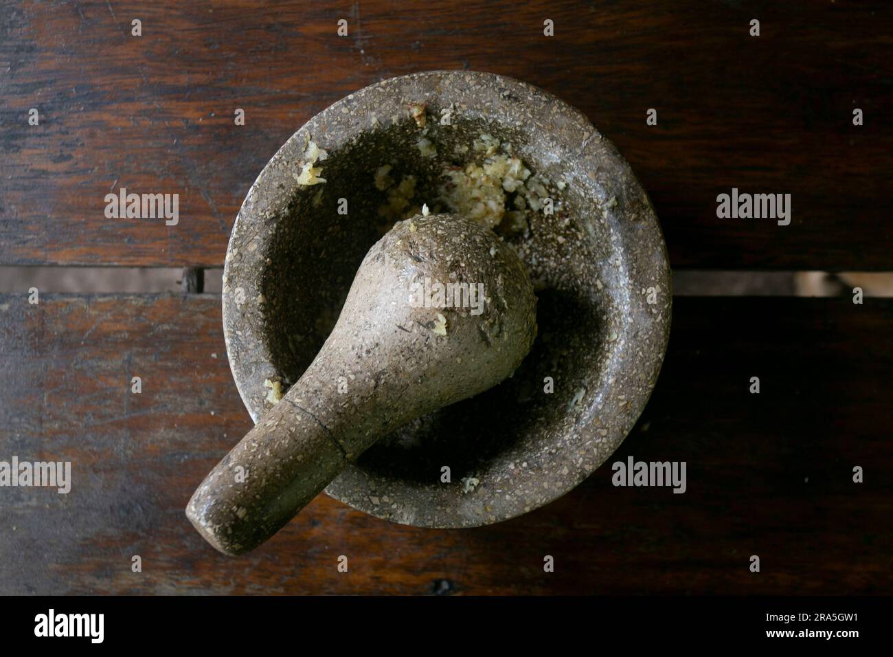 Stone mortar in a kitchen in the Peruvian jungle Stock Photo - Alamy