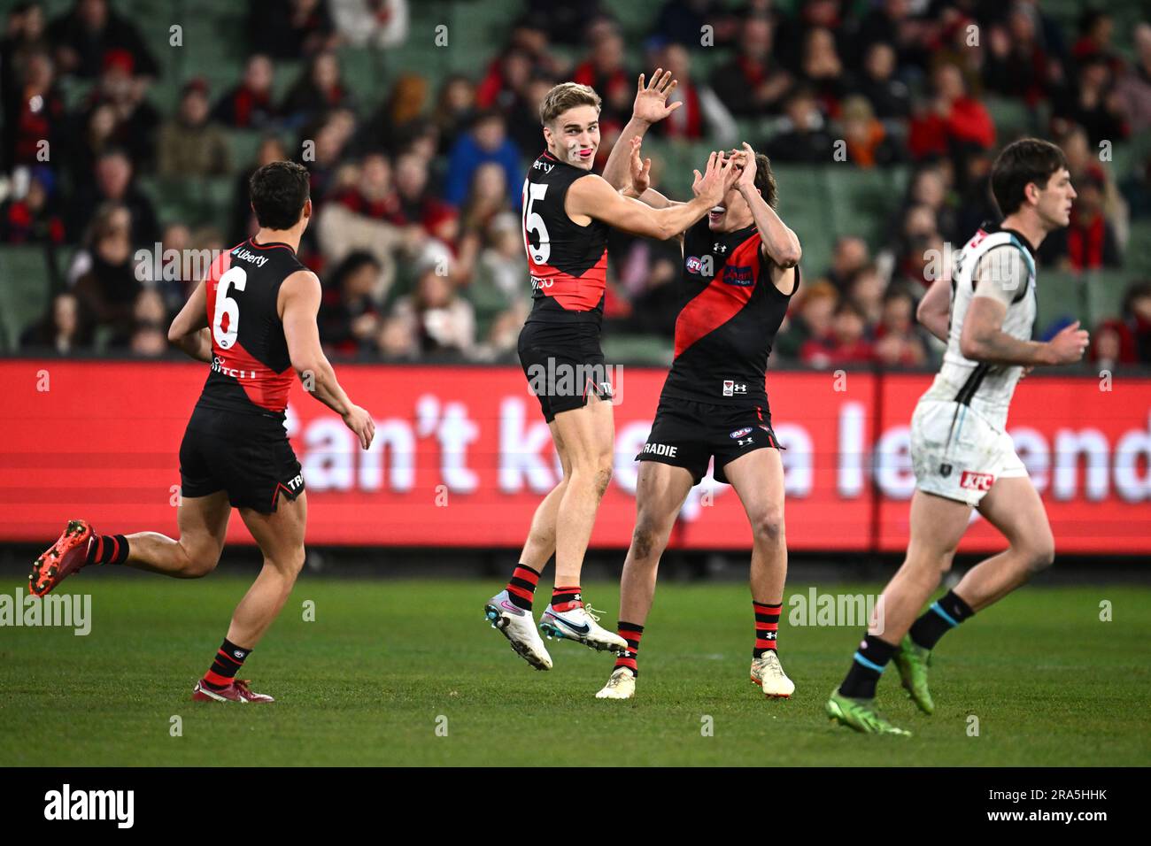 Melbourne, Australia. 01st July, 2023. Matt Guelfi of Essendon (centre ...
