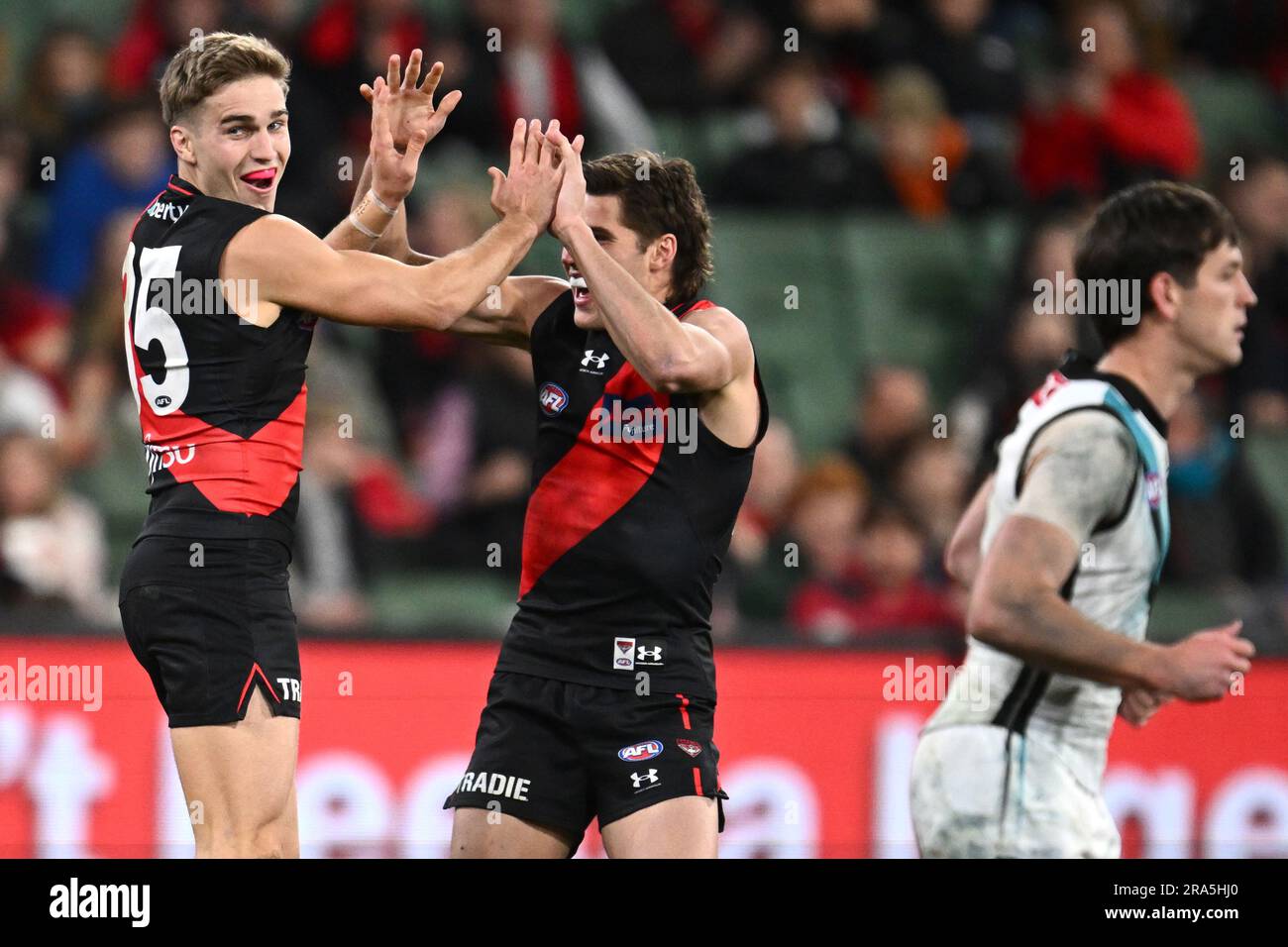 Melbourne, Australia. 01st July, 2023. Matt Guelfi of Essendon (centre ...